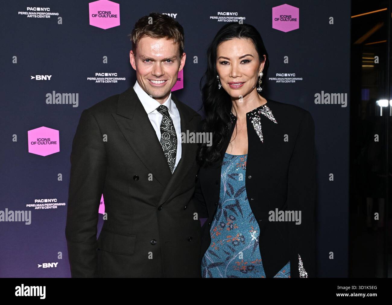 Mark Guiducci, left, and Wendi Deng Murdoch attend the PAC NYC Icons of ...