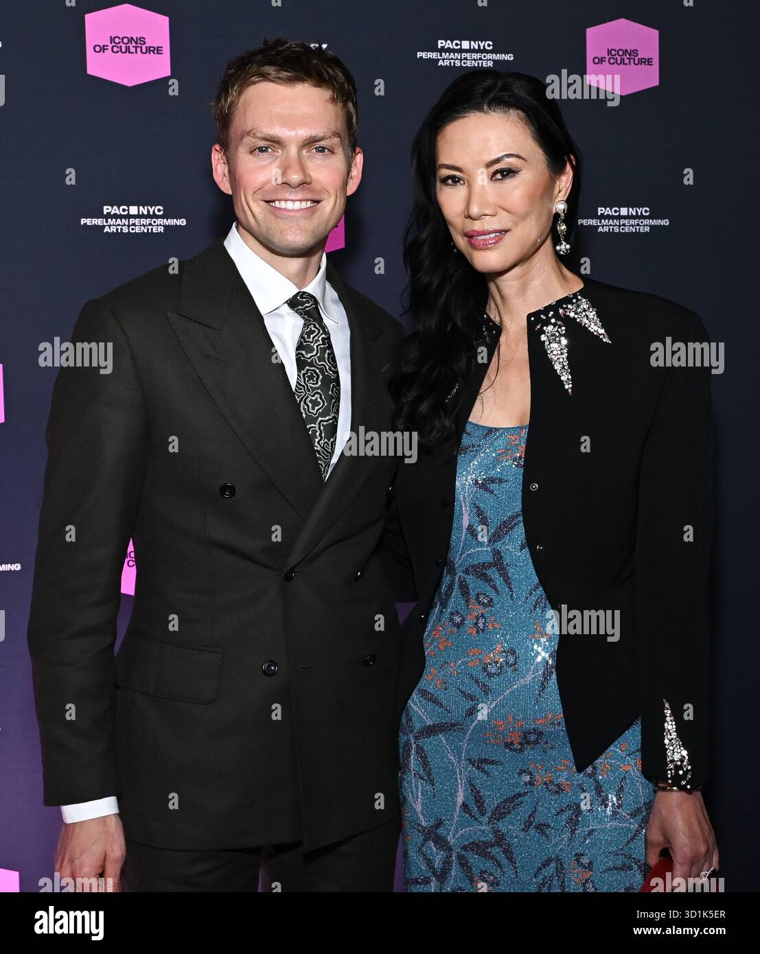Mark Guiducci, left, and Wendi Deng Murdoch attend the PAC NYC Icons of ...