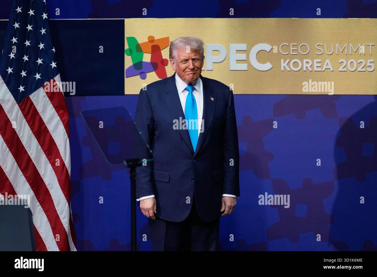 United States President Donald Trump stands on stage before speaking at ...