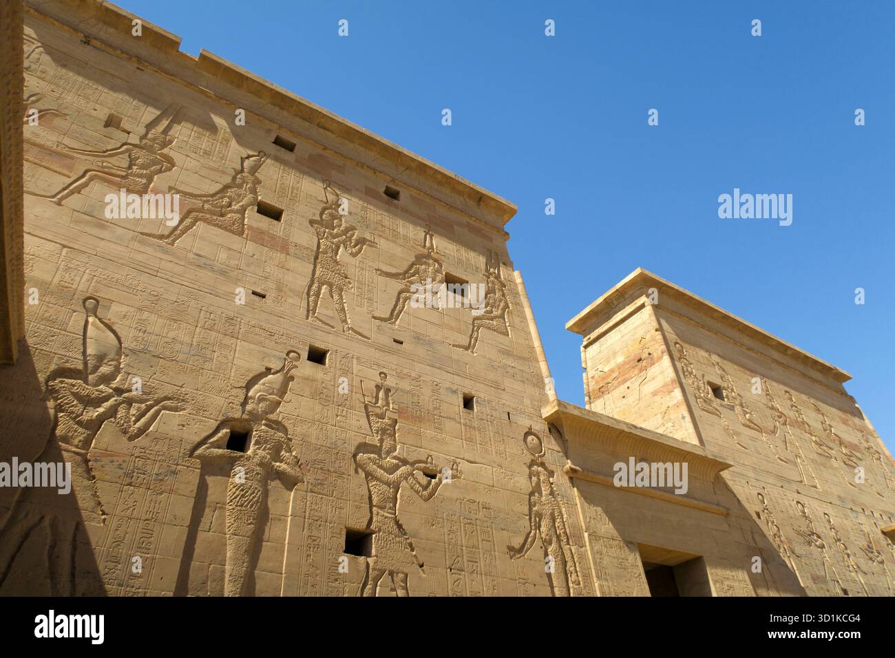 Ancient Egyptian temple walls with detailed carvings and hieroglyphs ...