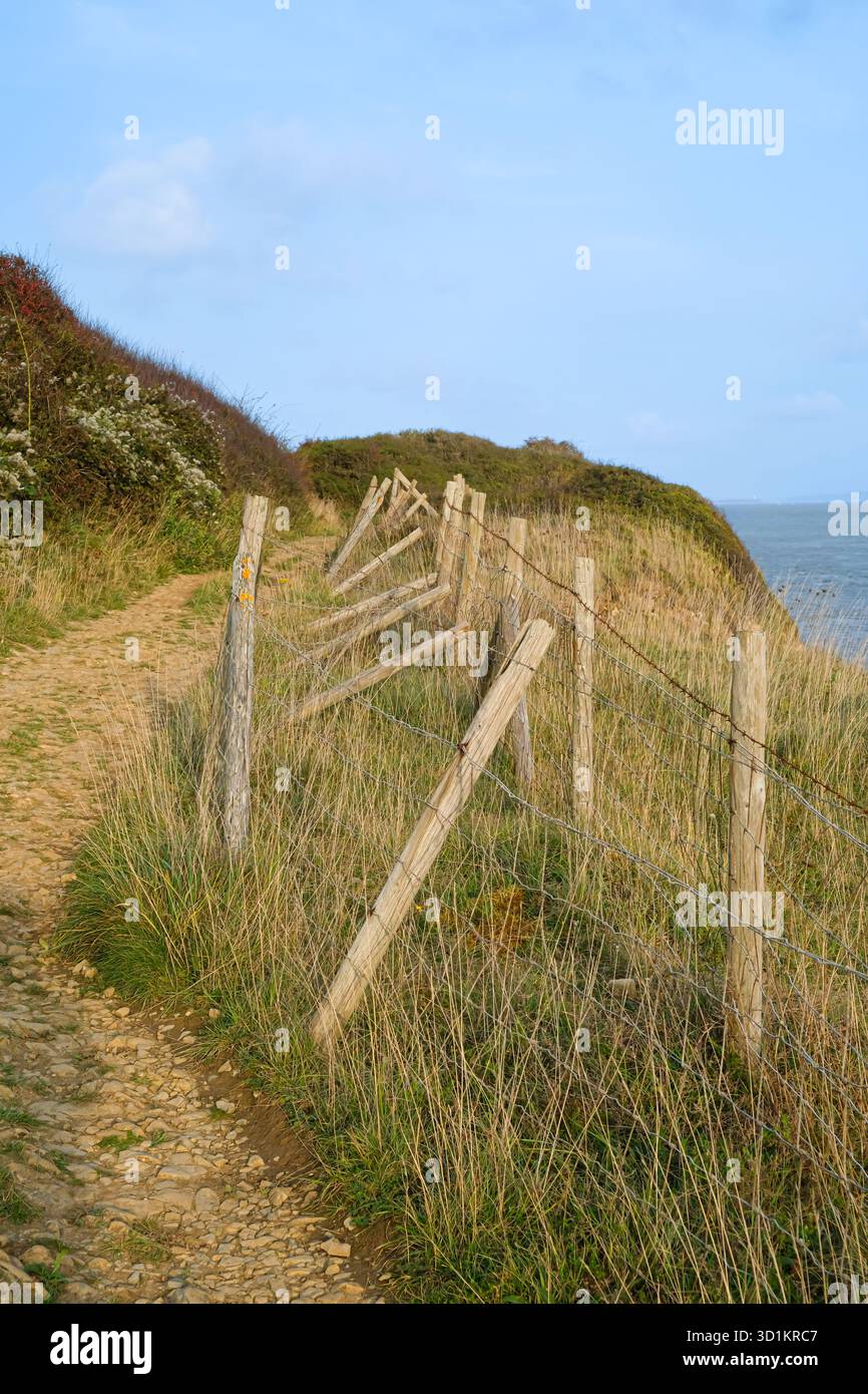 Leaning Fence Along the Coastal Path Stock Photo - Alamy