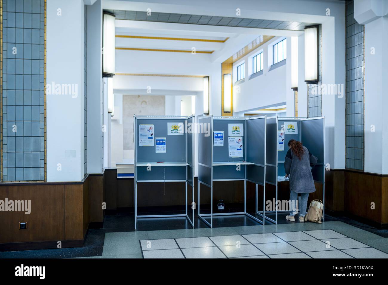 THE HAGUE - People cast their votes for the House of Representatives ...