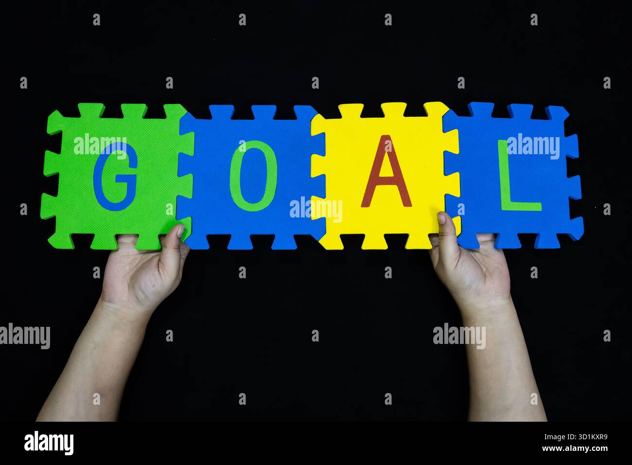 success and achievement concept goal letters on interlocking tiles ...