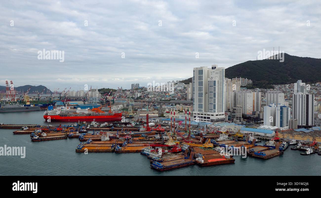 BUSAN, SOUTH KOREA - OCTOBER 9, 2025 - Busan port bustling with various ...