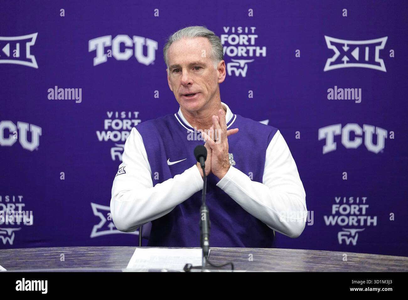 FILE - TCU head coach Jamie Dixon responds to questions during a post ...