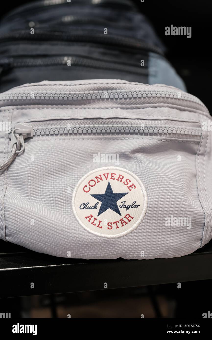 Gray nylon zip pouch by Converse features the brand logo with a star ...