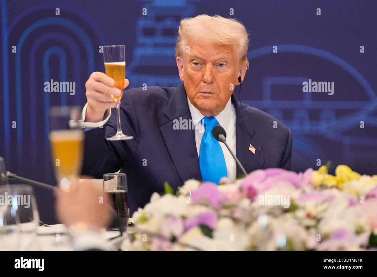 President Donald Trump toasts with state leaders during a dinner event ...