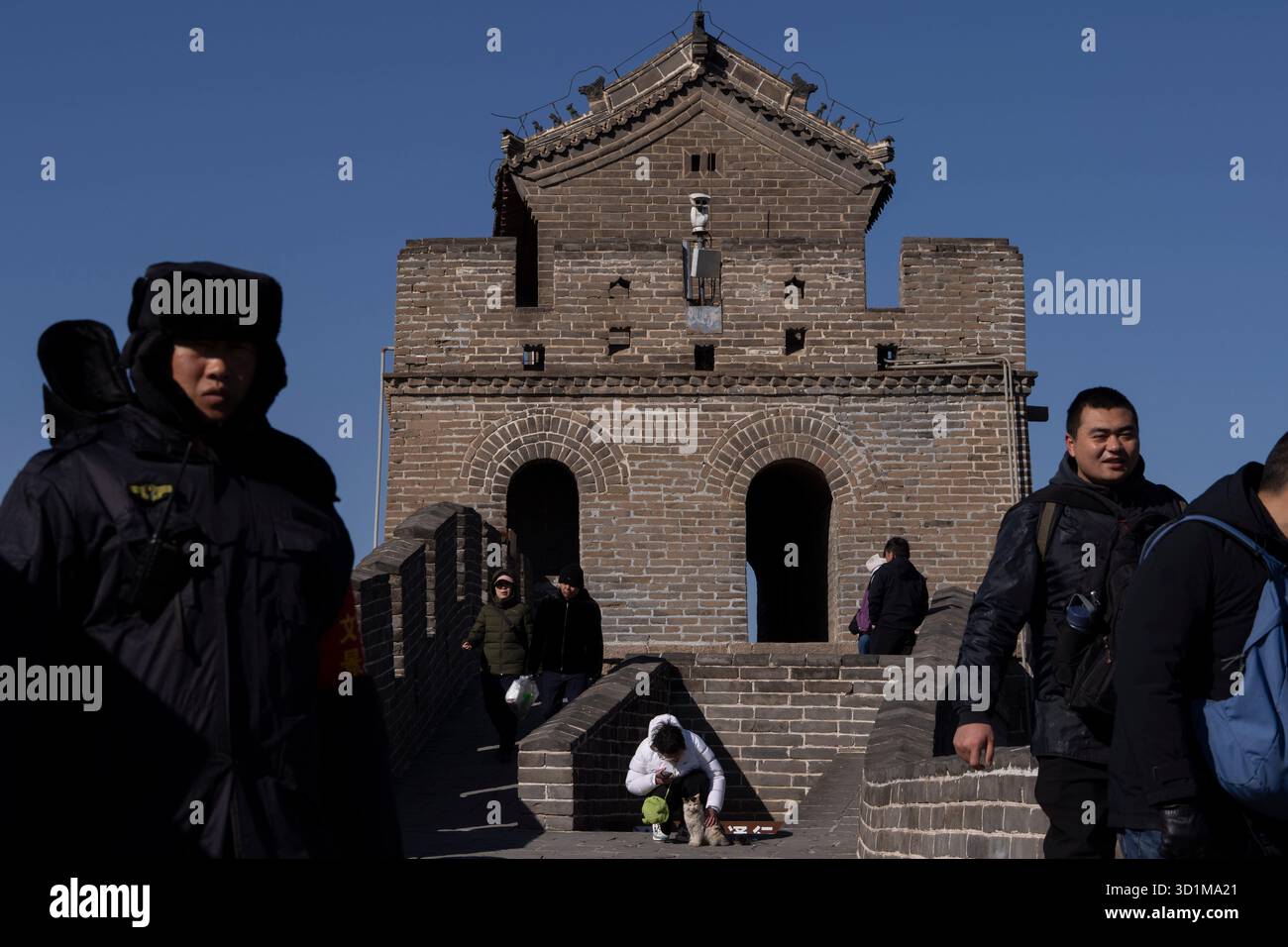 A security camera monitors visitors to the Great Wall of China on the ...