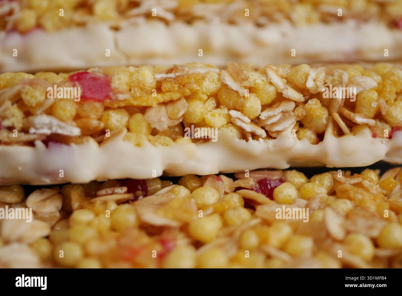 Crunchy snack bars with oats and fruits ready to enjoy Stock Photo - Alamy