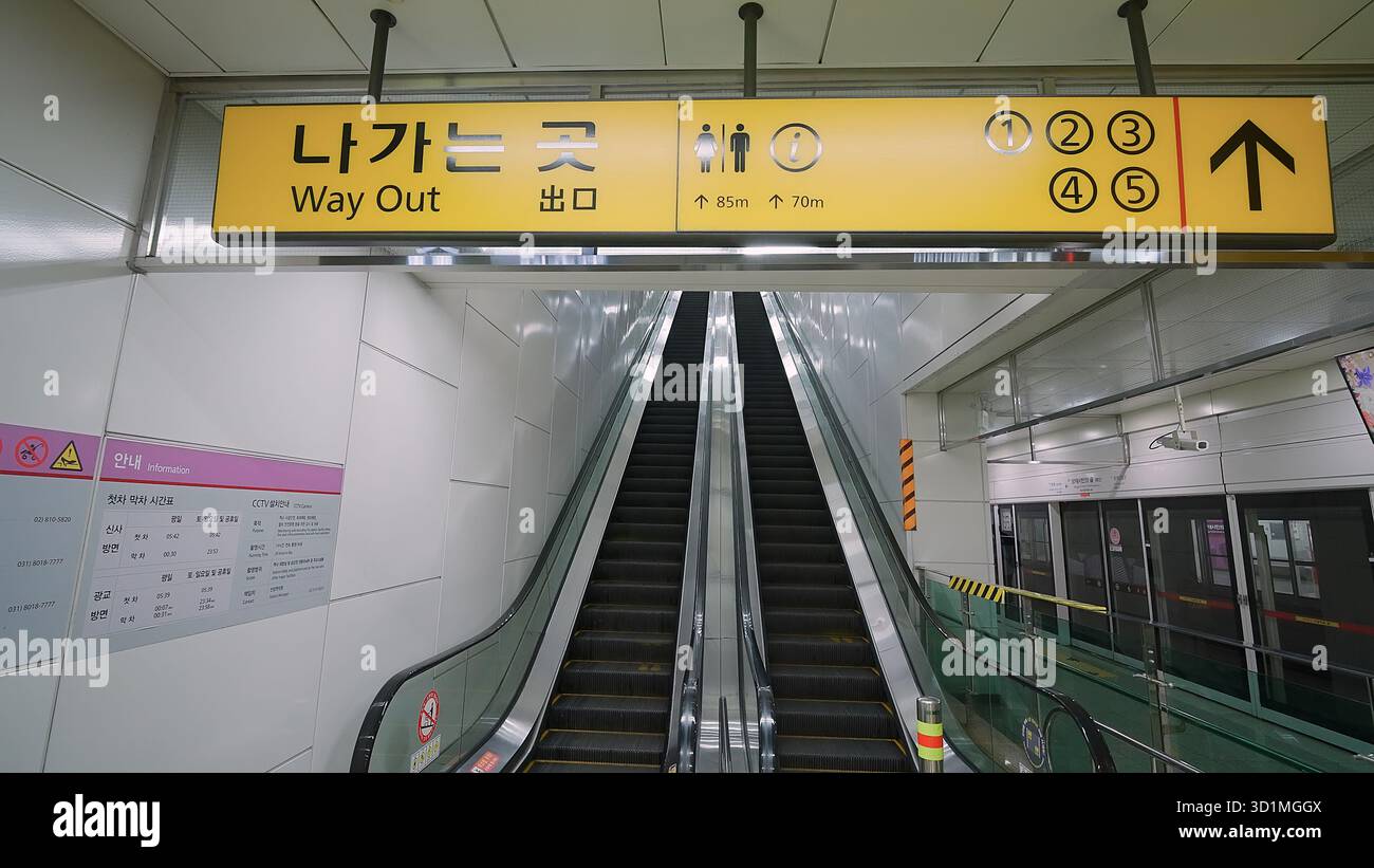 SEOUL, SOUTH KOREA - OCTOBER 11, 2025 - Escalator leading up from a ...
