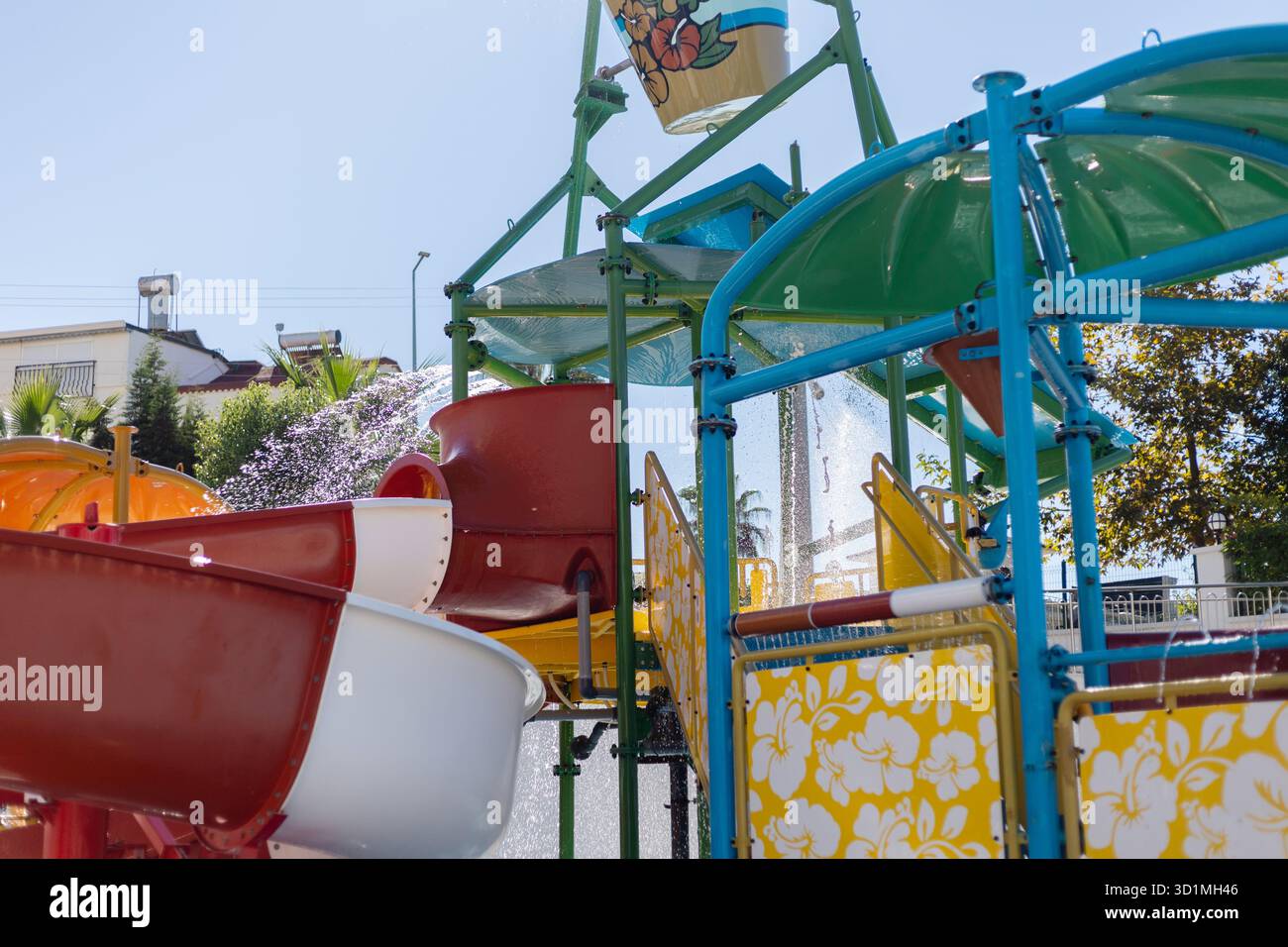 Brightly colored water playground slides hi-res stock photography and ...
