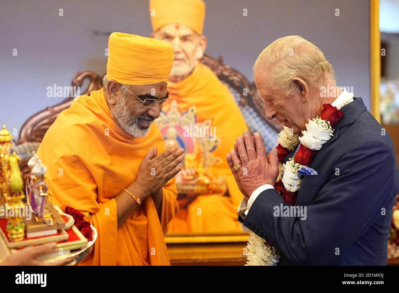 Britain's King Charles III receives a ceremonial welcome from the head ...