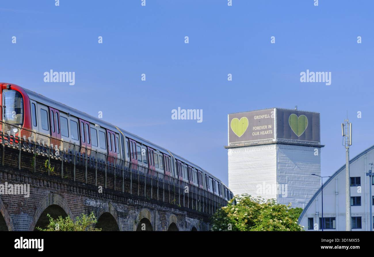 London, England - June 15, 2023: A train passes in North Kensington ...