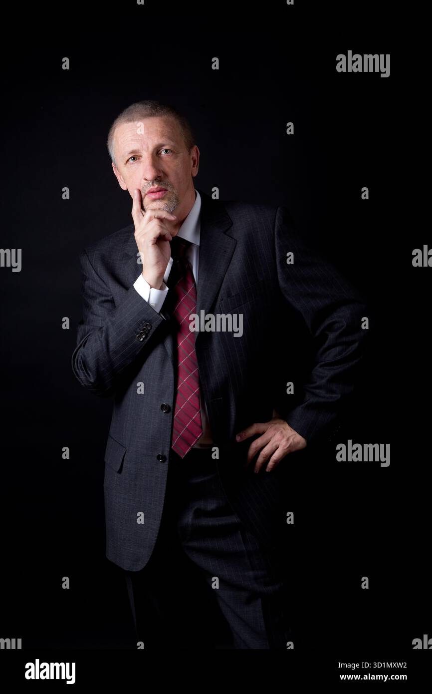 Thoughtful man holding human hi-res stock photography and images - Alamy