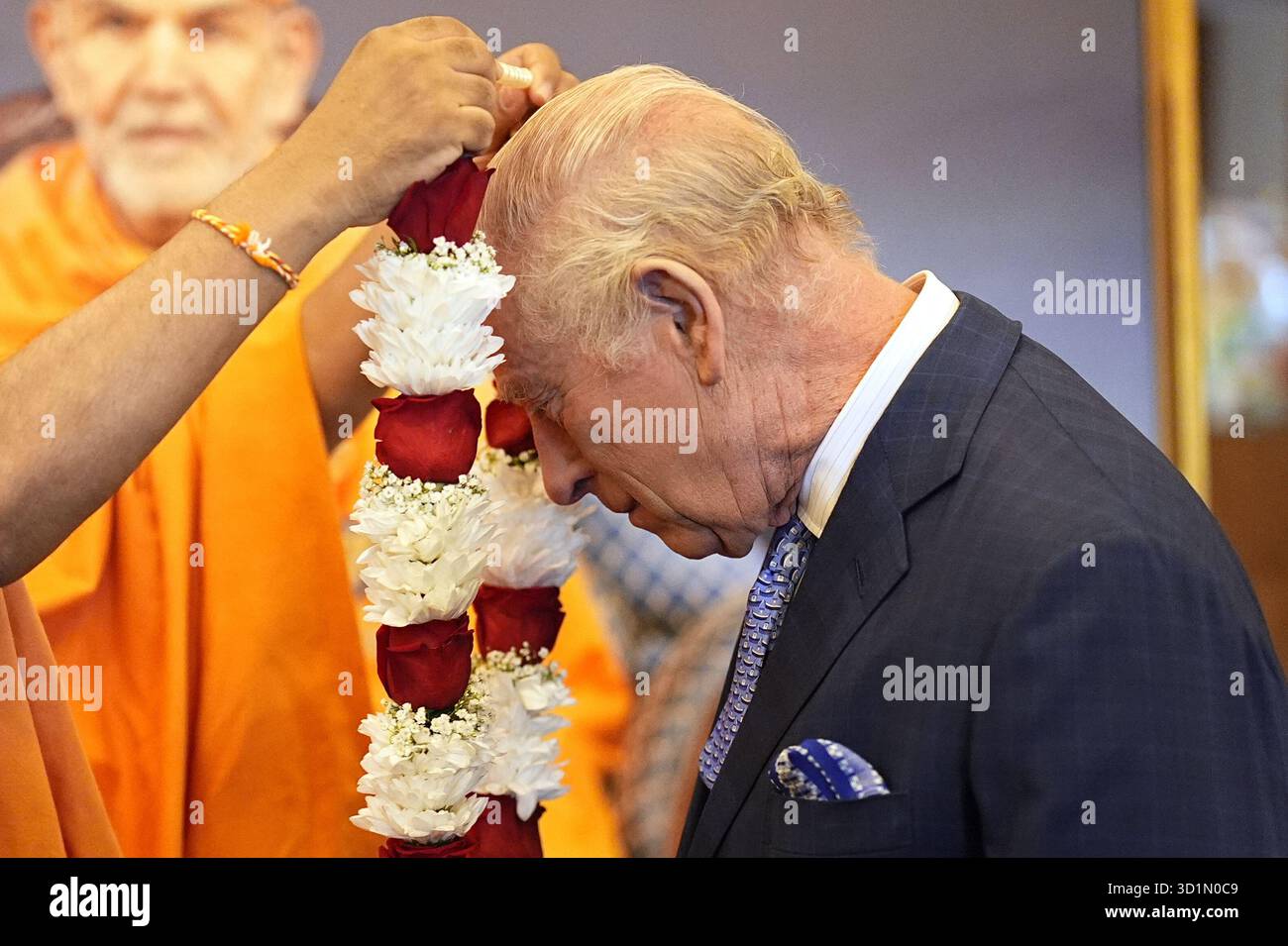 Britain's King Charles III receives a ceremonial welcome from the head ...