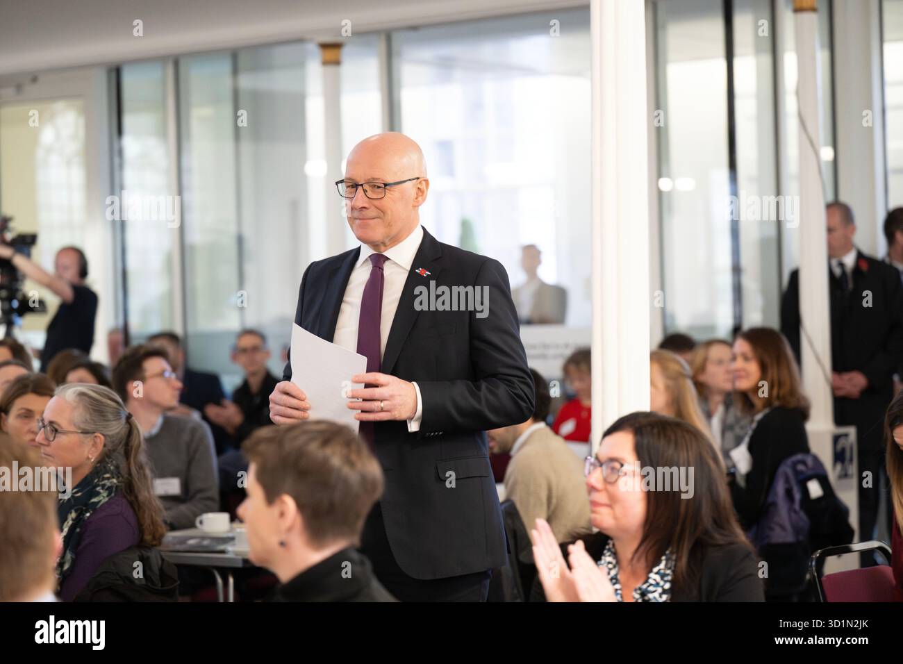 First Minister of Scotland John Swinney speaking at the IPPR Scotland ...