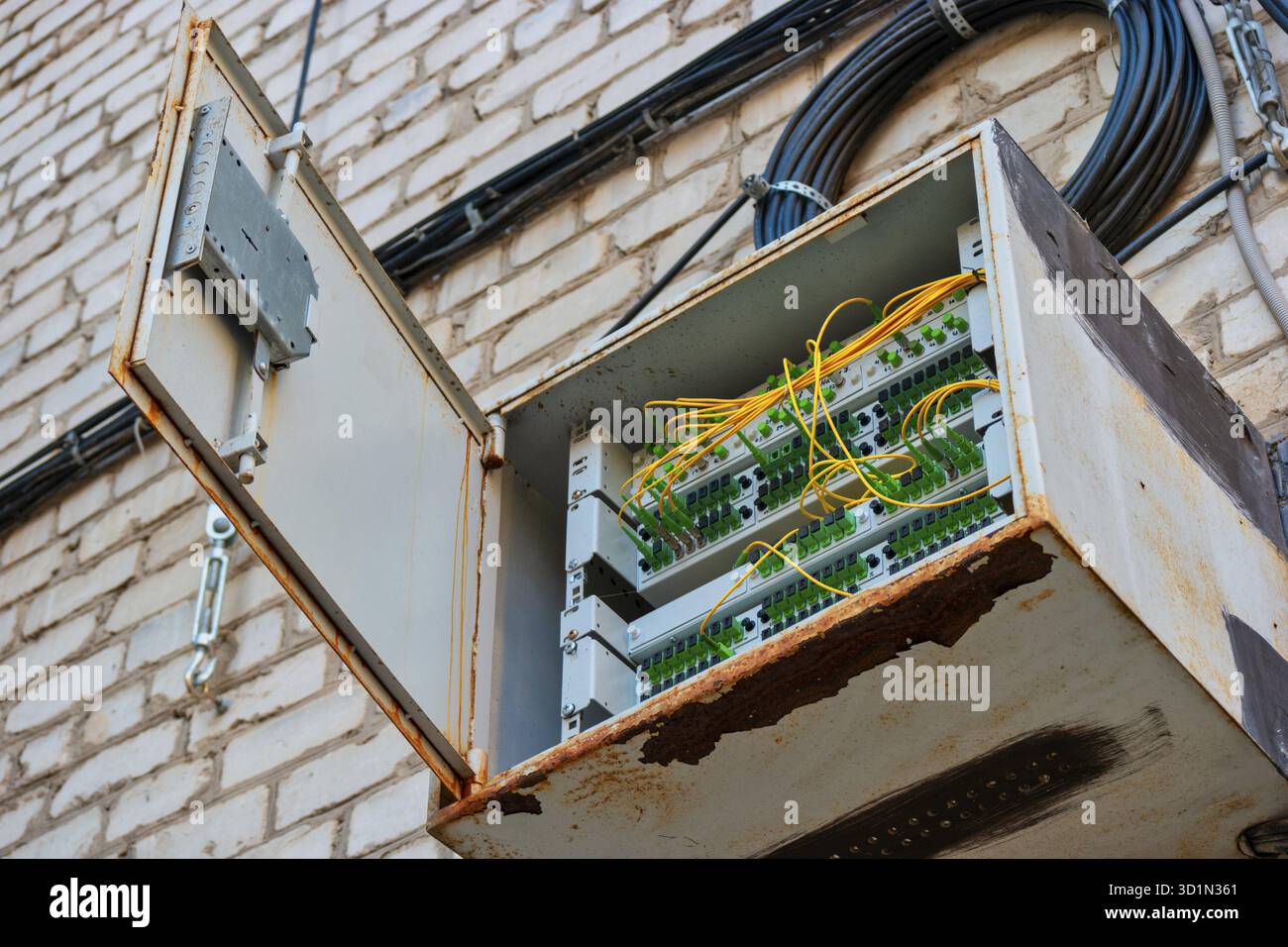 Fiber Optic Switch Panel On Apartment Building Wall With Coils Of Wires ...