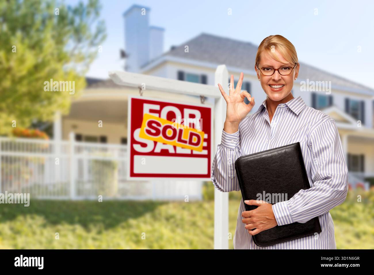 Real Estate Agent in Front of Sold Sign and House Stock Photo - Alamy