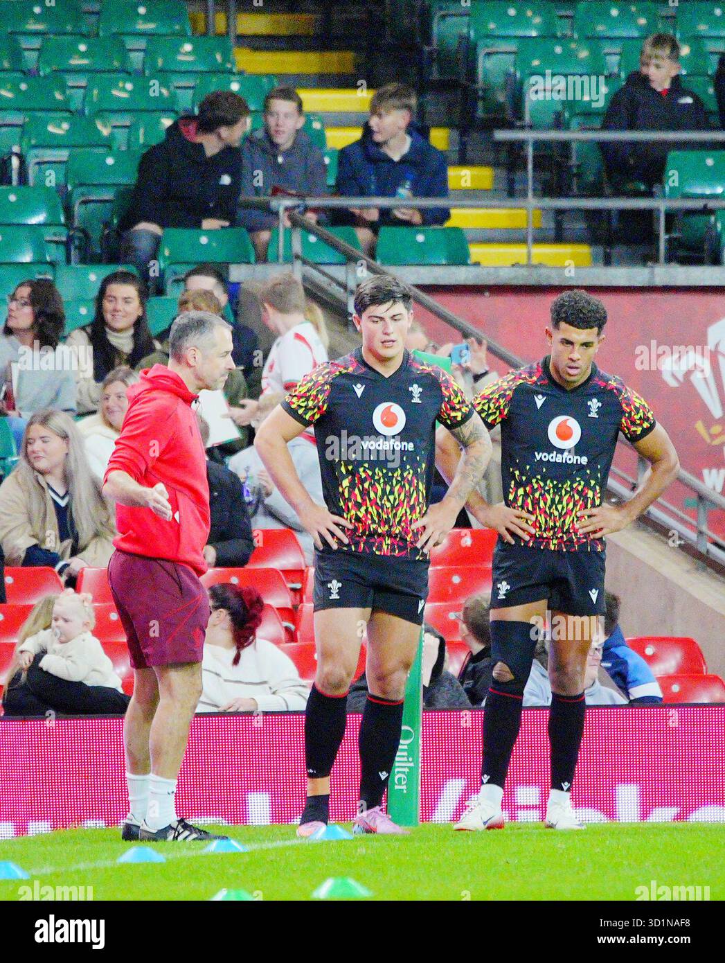 Wales' Rio Dyer (right) and Louis Rees-Zammit (centre) during a ...