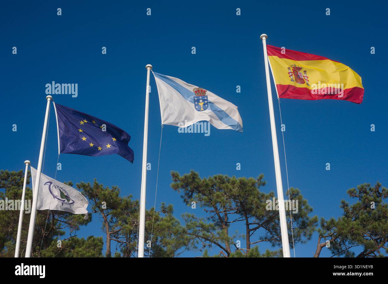 Resort, European Union, Spanish and Galician flags flying at La Toja (A ...