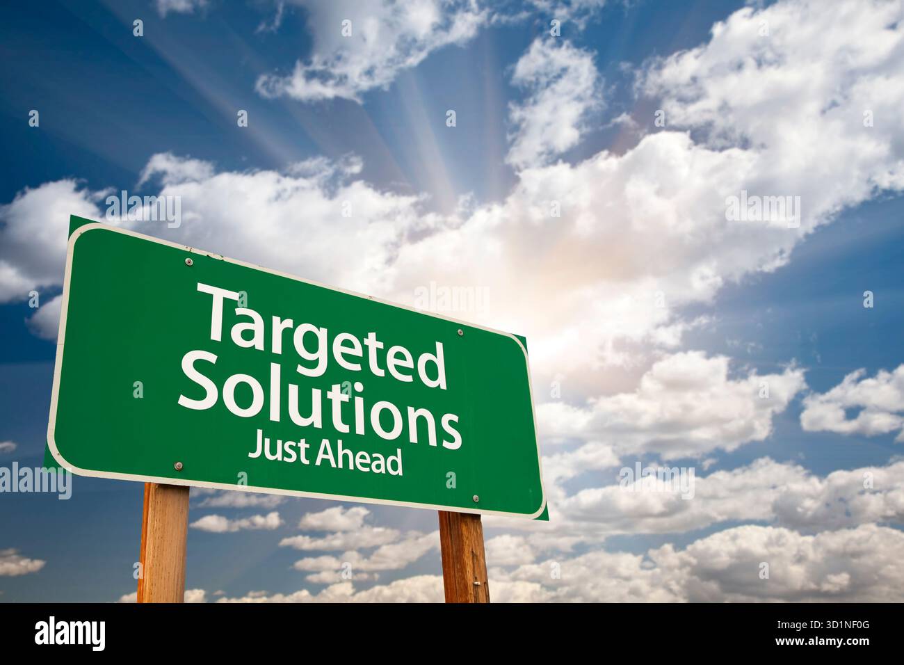 Targeted Solutions Green Road Sign Over Clouds Stock Photo - Alamy
