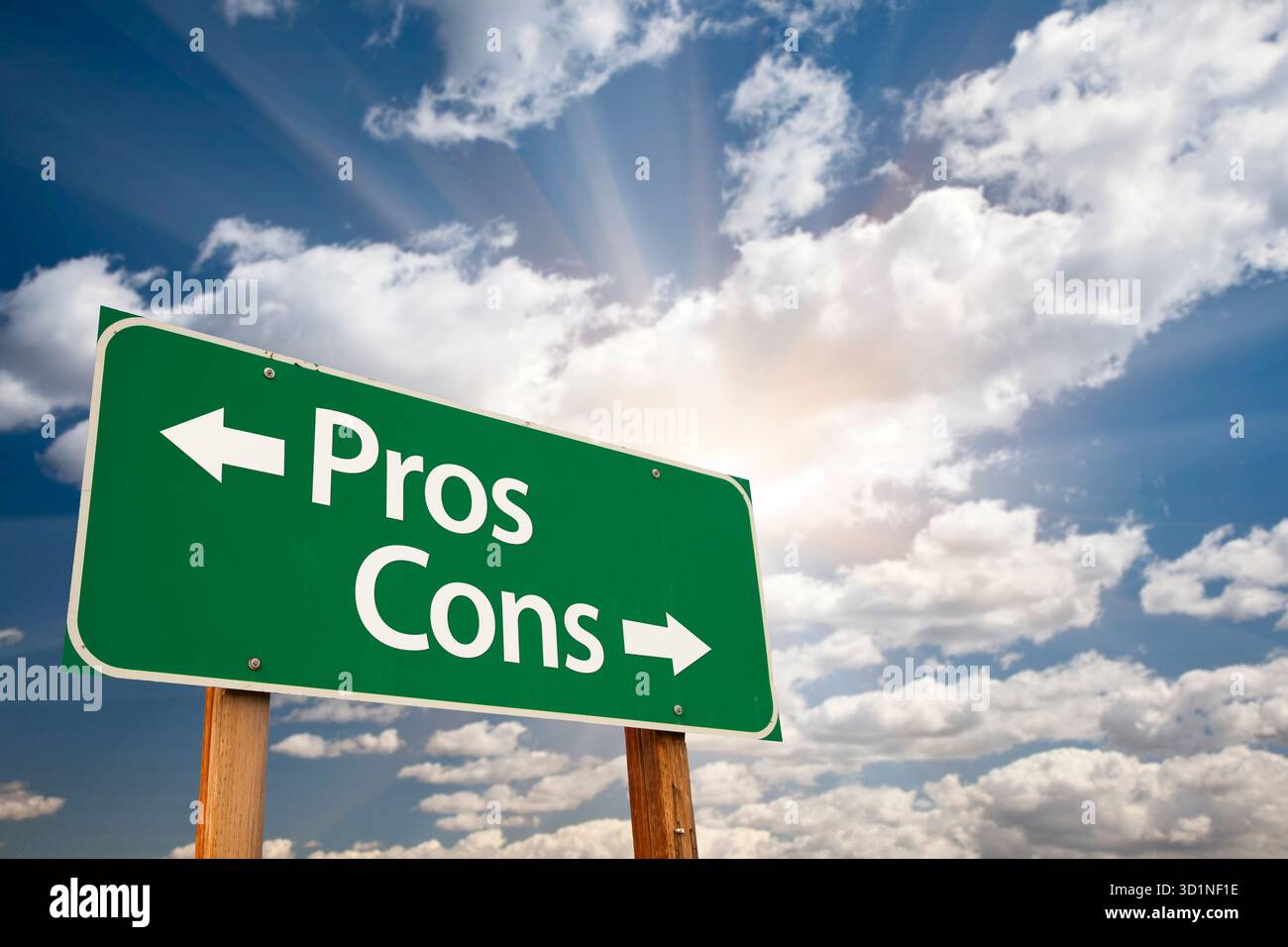 Pros and Cons Green Road Sign Over Clouds Stock Photo - Alamy