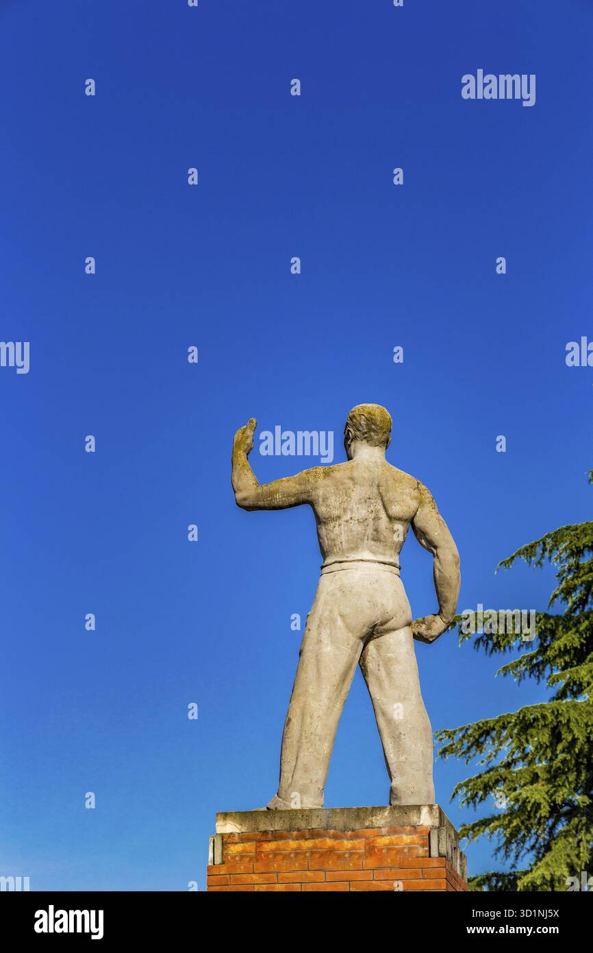 Stocky and muscular statue of inspiration from Fascist period, a ...