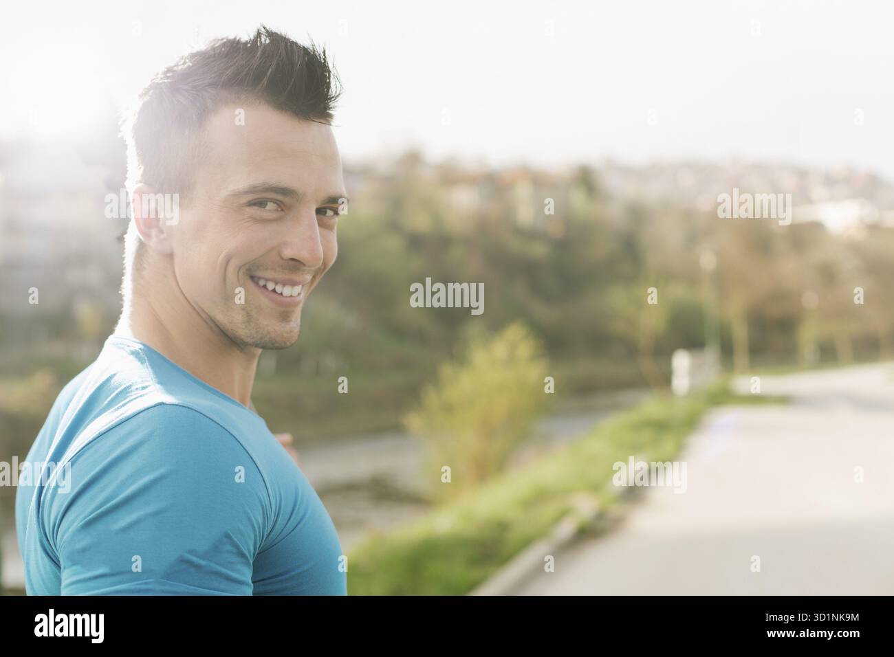 Focused handsome athlete resting after long run Stock Photo - Alamy