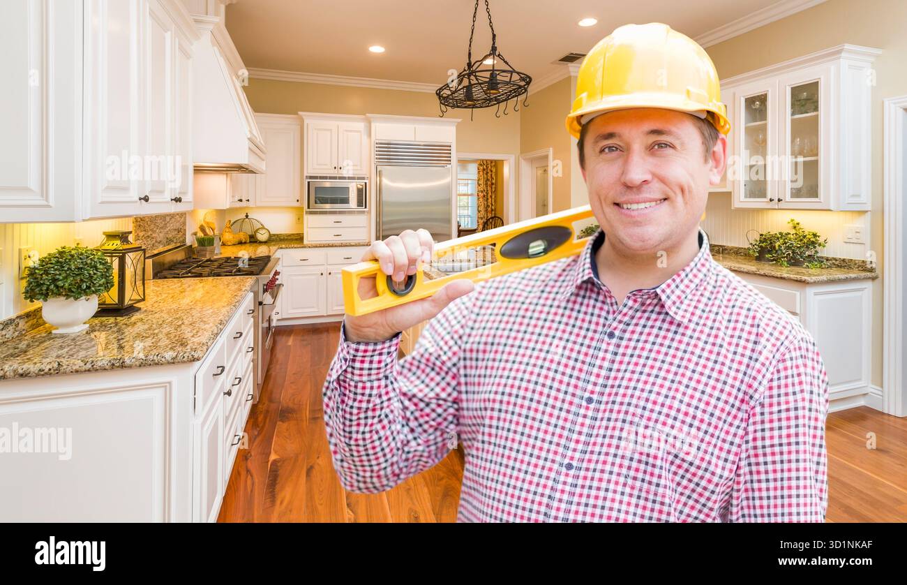 Smiling contractor level wearing hi-res stock photography and images ...