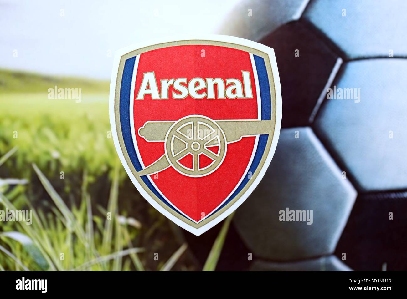 KYIV, UKRAINE - FEBRUARY 23, 2025 Arsenal FC football club badge lies ...