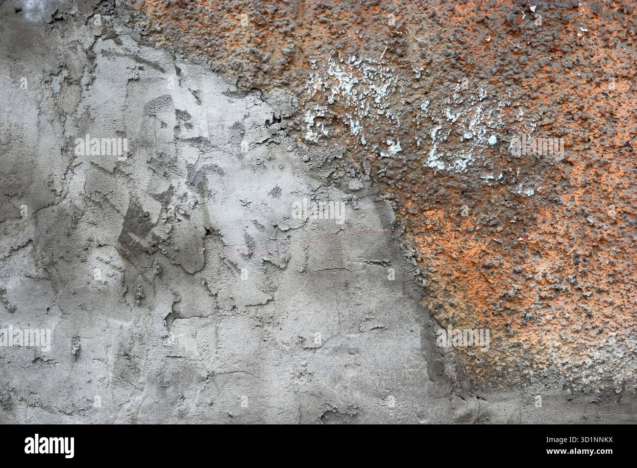 Half covered with plaster, half concrete wall Stock Photo - Alamy