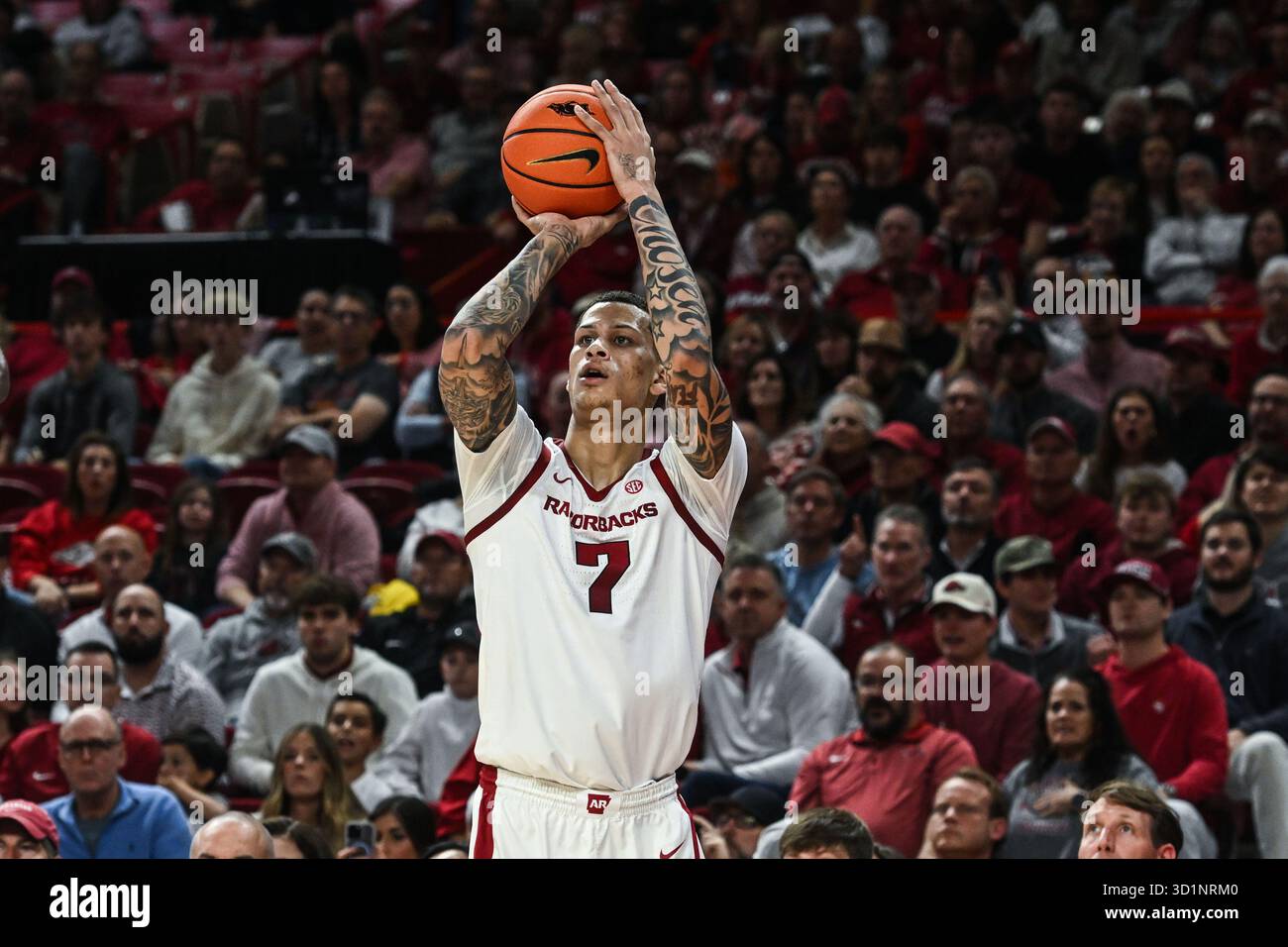Arkansas forward Trevon Brazile (7) pulls up to shoot a three point ...