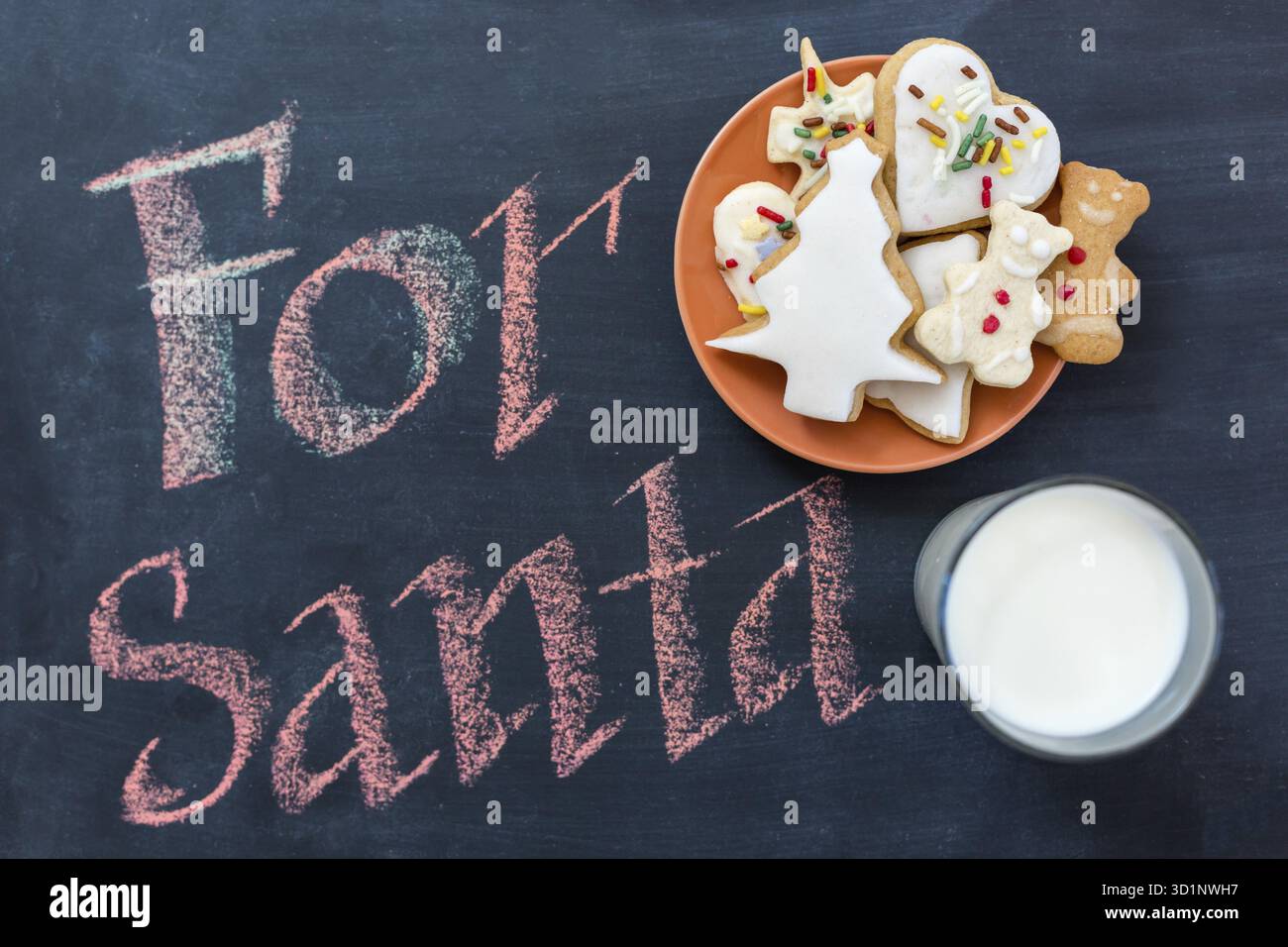 Milk and cookies for Santa Claus Stock Photo - Alamy