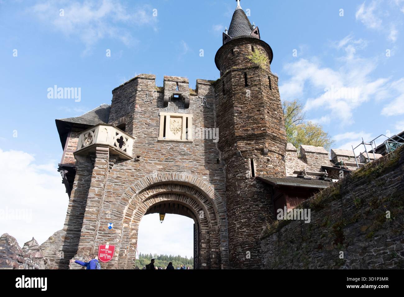 Arched gateway entrance to Reichsburg castle originally built in 11thc ...