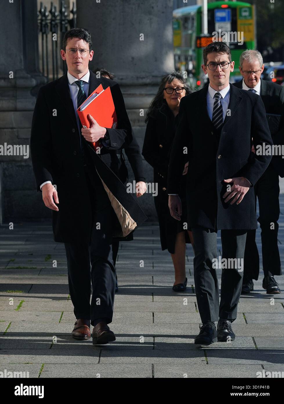 Enoch Burke (left) with family members including his brother Isaac ...