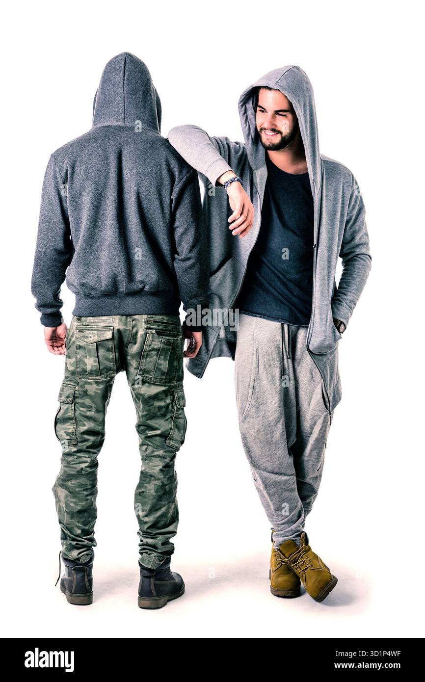 Two young men wearing military and sport clothes Stock Photo - Alamy