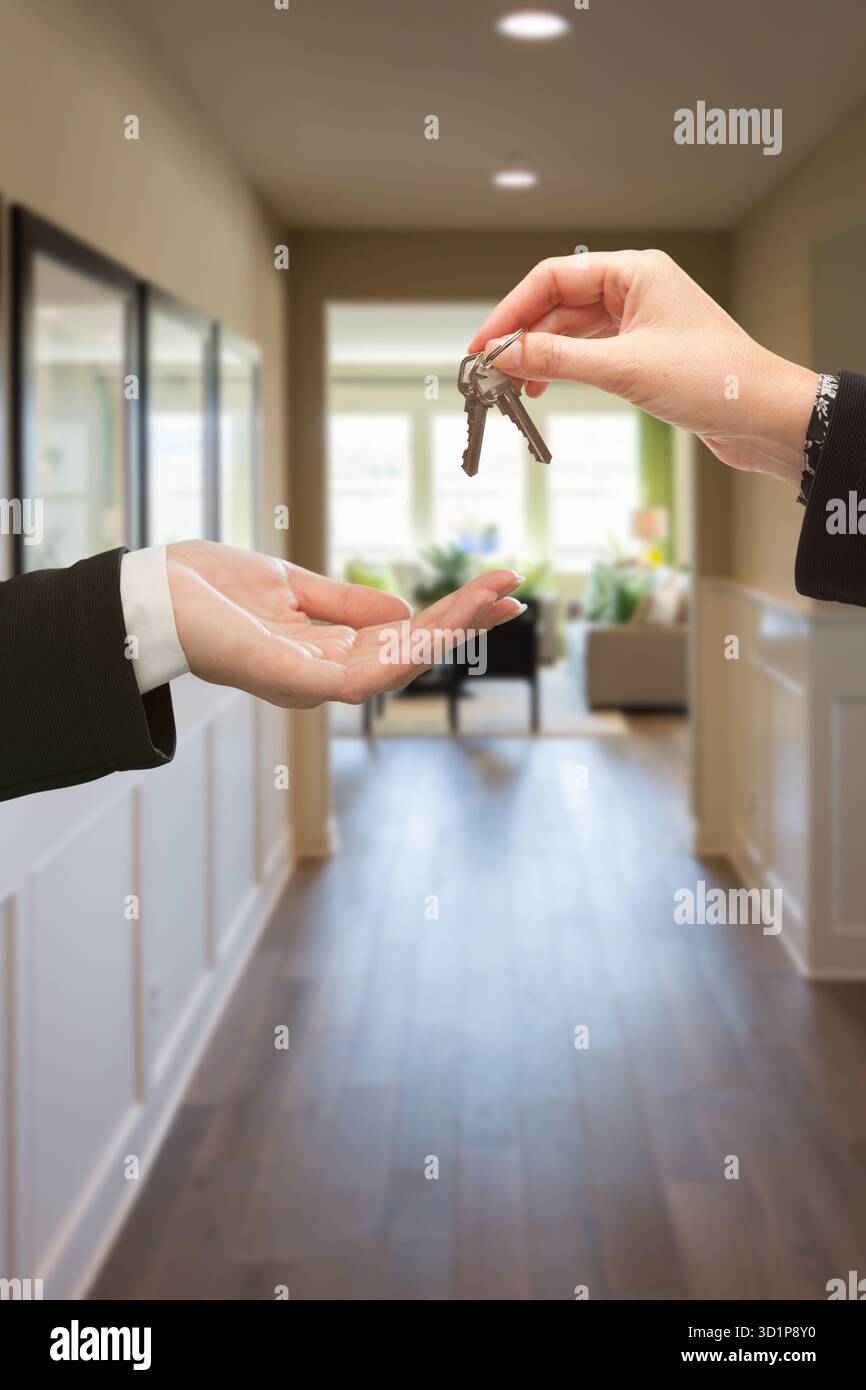Handing Over The Keys Inside House Stock Photo - Alamy
