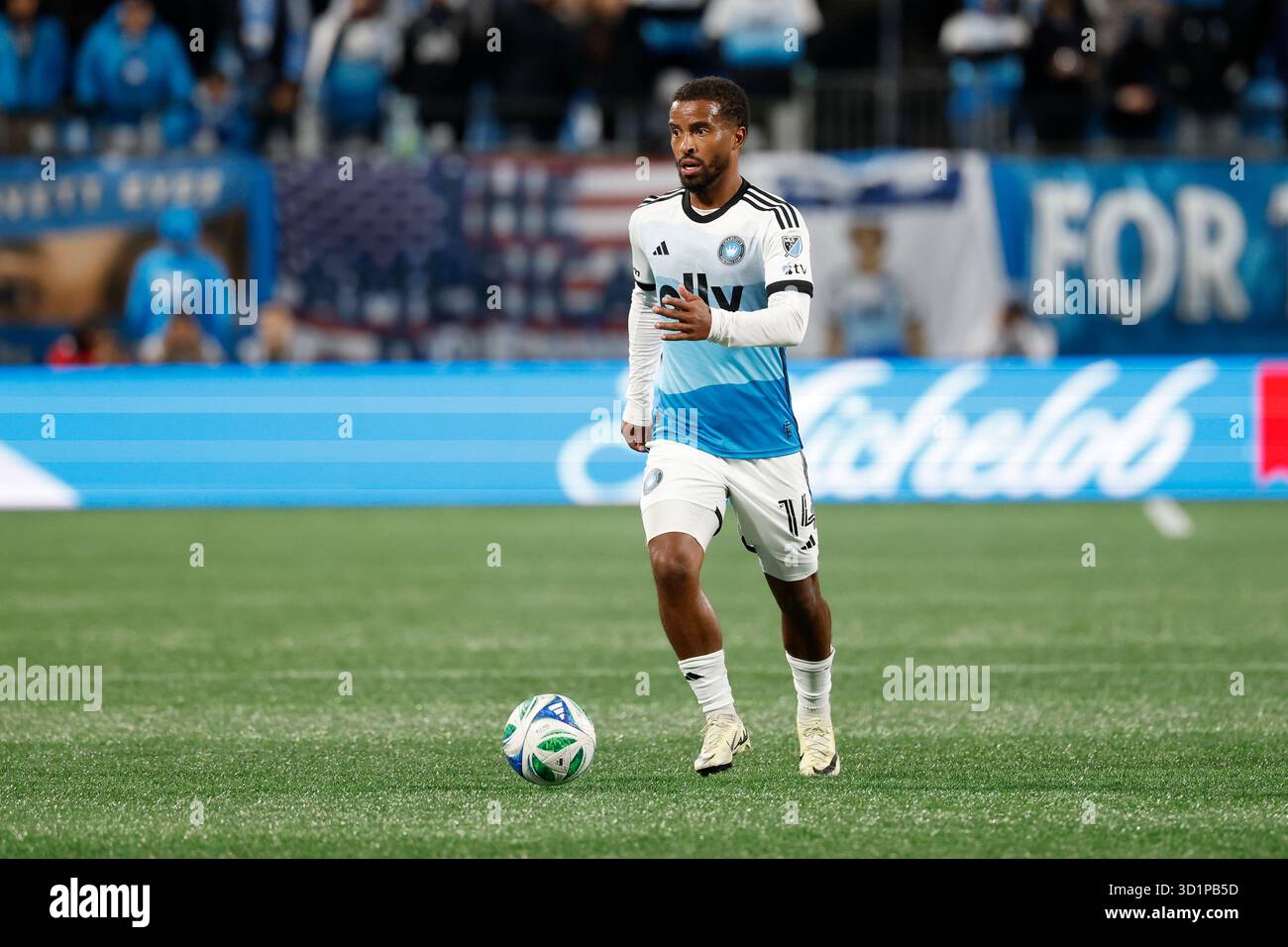 Charlotte FC defender Nathan Byrne moves the ball against New York City ...
