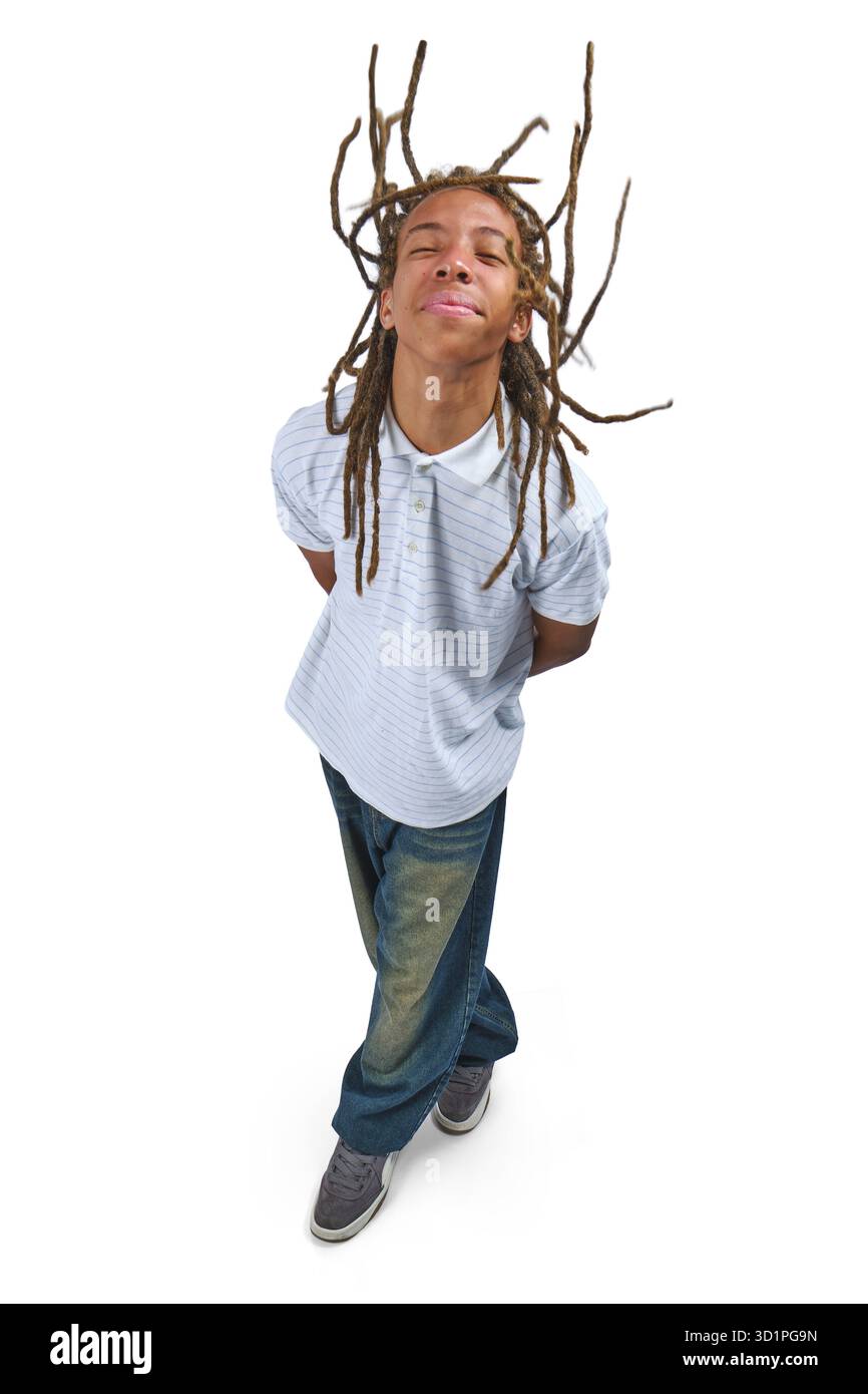 Young man with dreadlocks dancing happily with eyes closed, isolated on ...