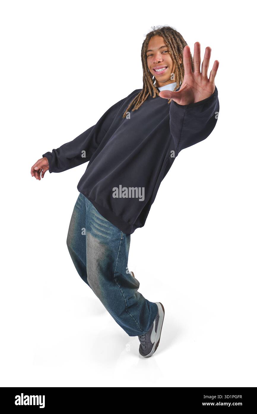 Young man with dreadlocks dancing happily with eyes closed, isolated on ...