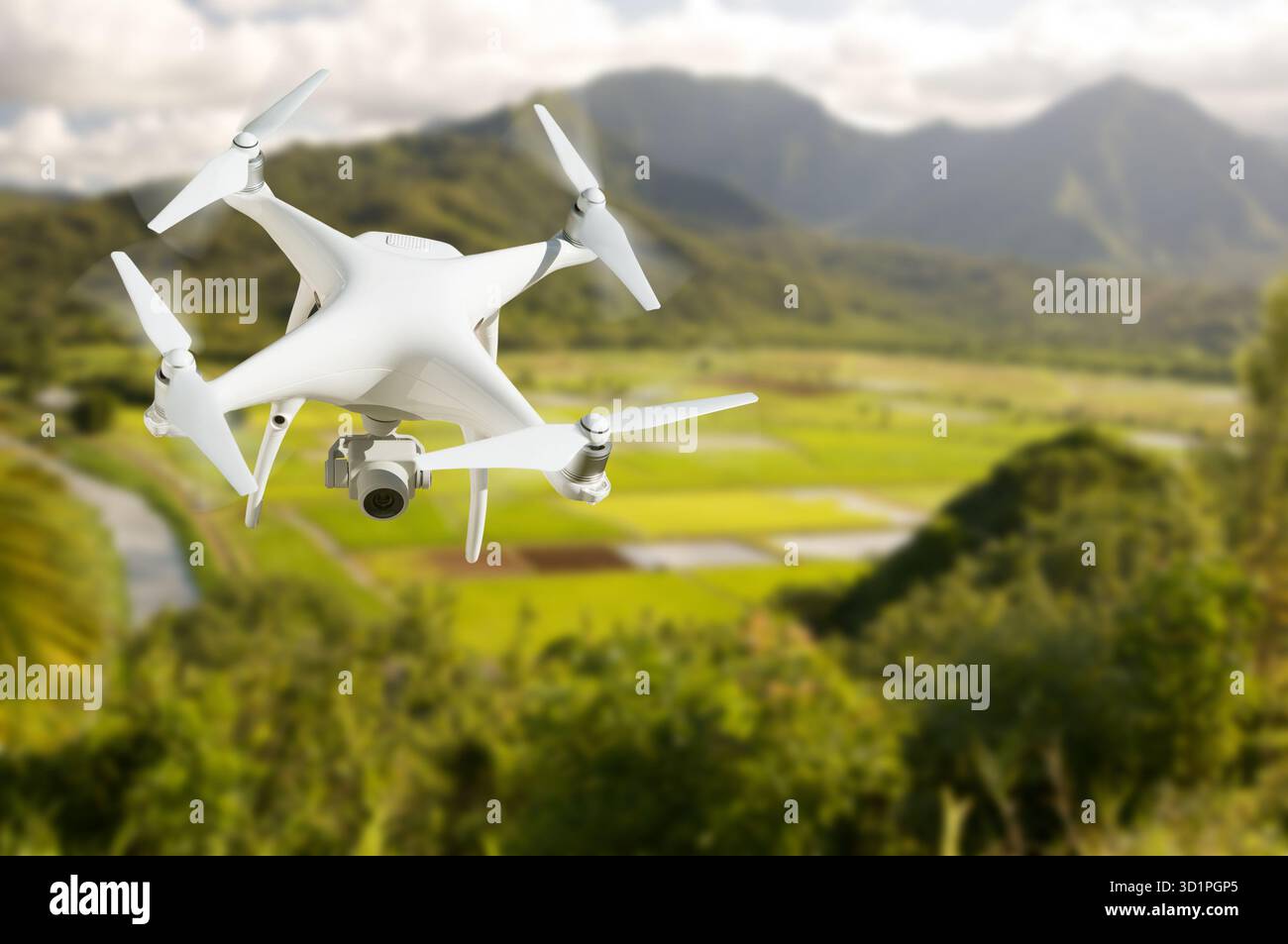 Unmanned Aircraft System (UAV) Quadcopter Drone In The Air Over Hanalei ...