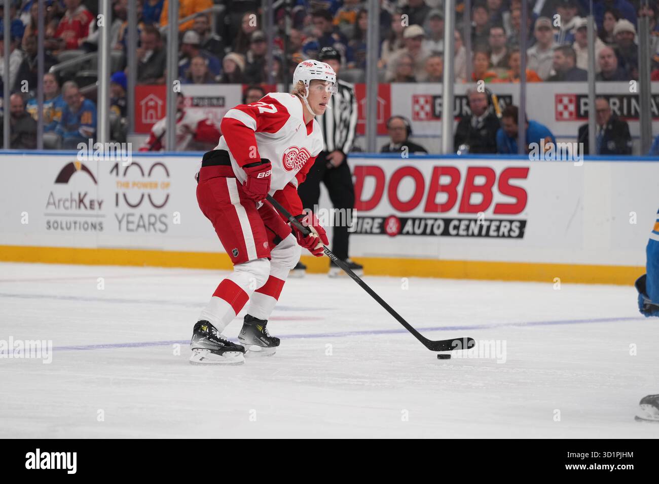 Detroit Red Wings defenseman Simon Edvinsson (77) handles the puck ...