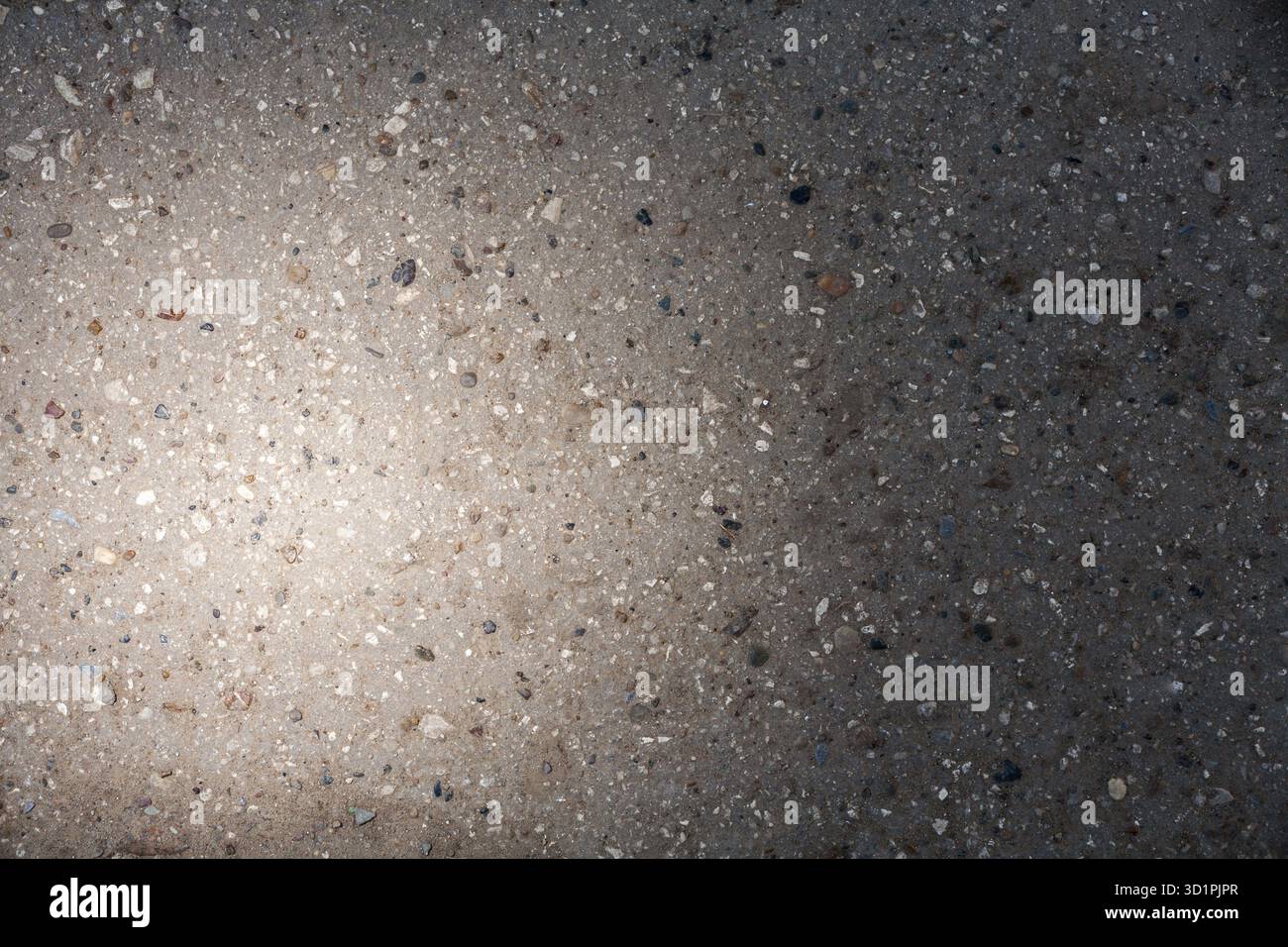 Concrete wall with spot of light Stock Photo - Alamy