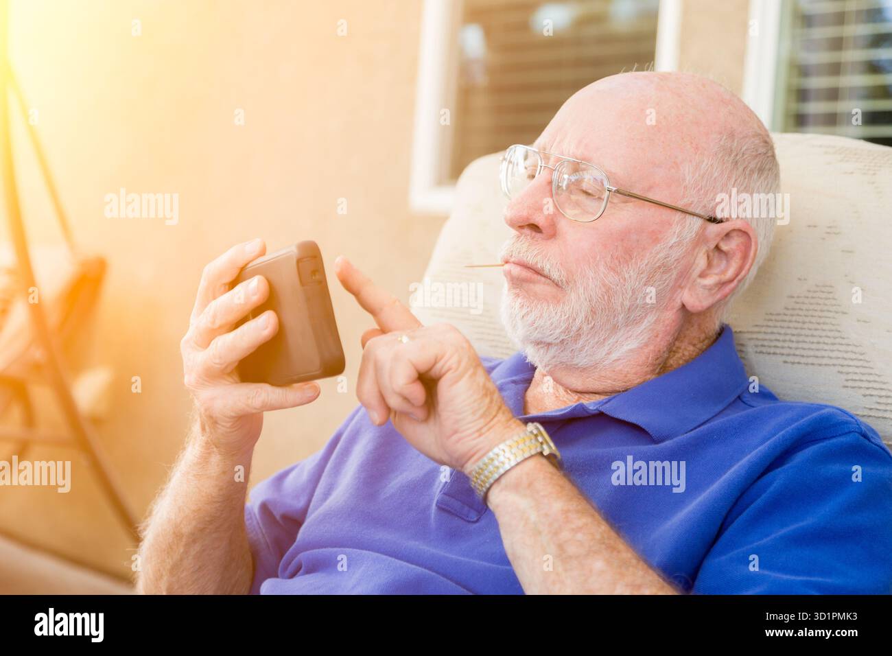 Happy senior old man using hi-res stock photography and images - Alamy