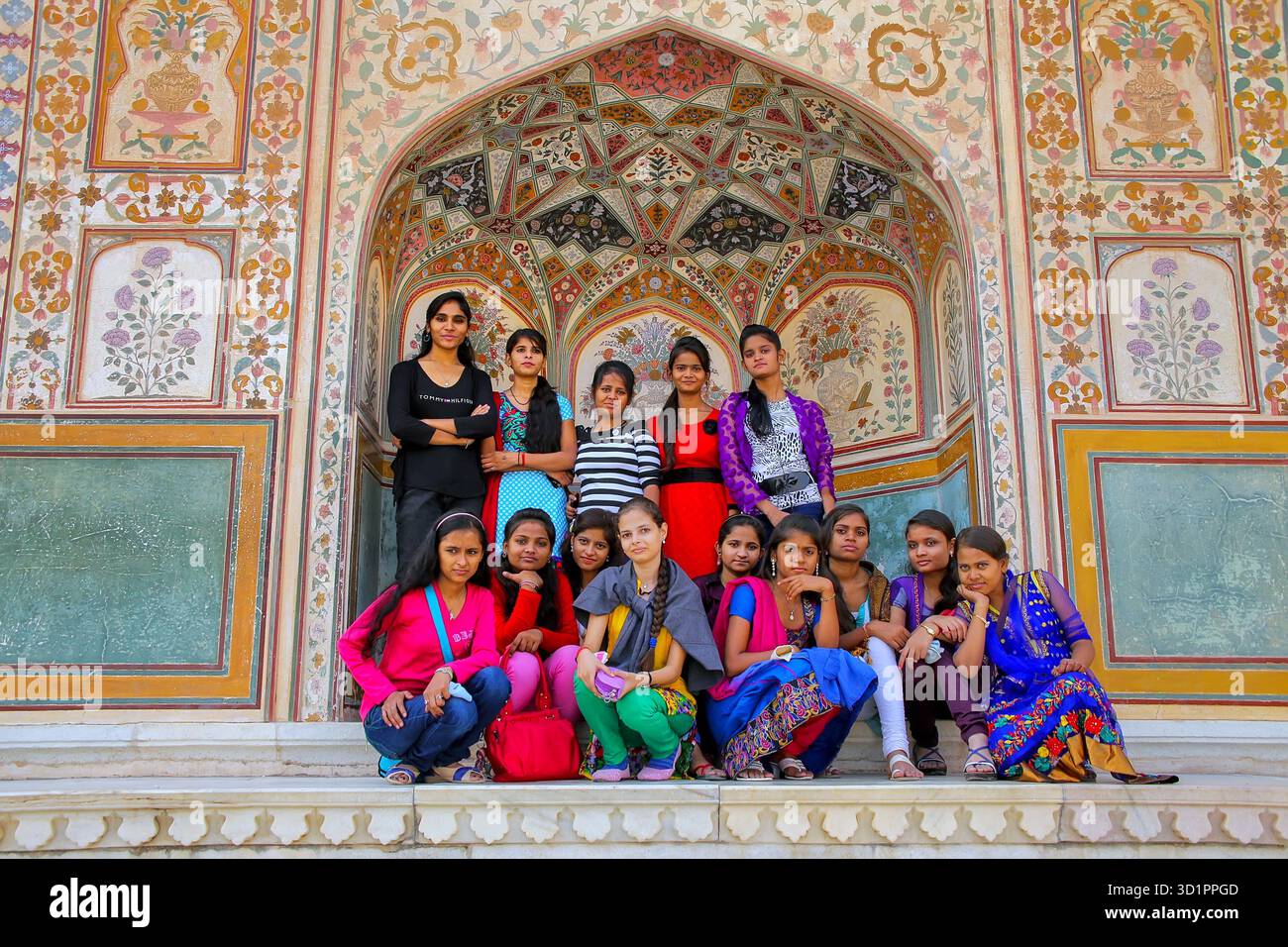 Group of young women gathering at Ganesh Pol in Amber Fort, Rajasthan ...