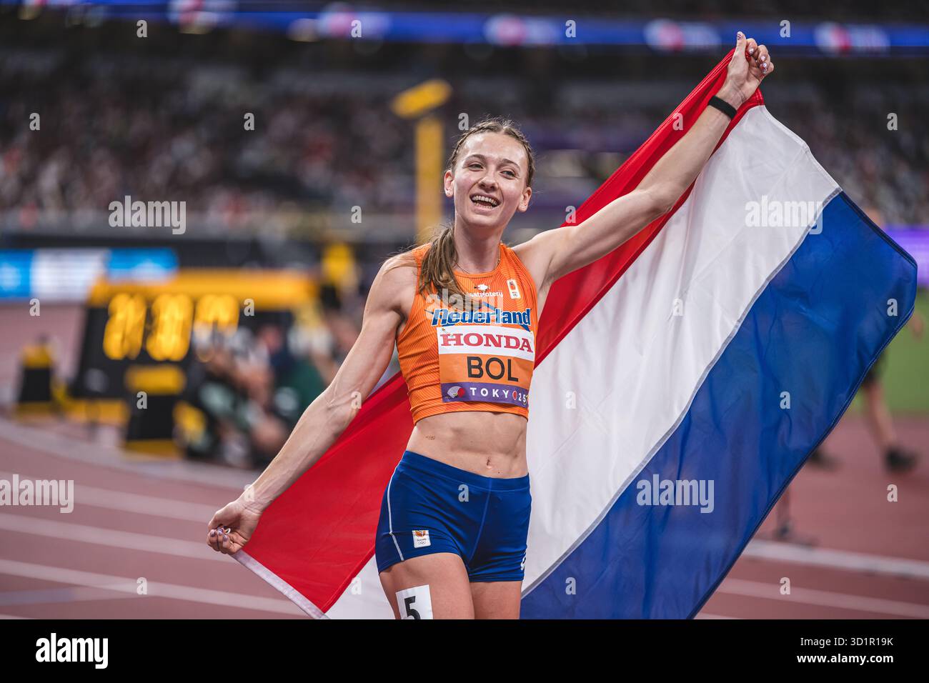 Femke Bol celebrating her medal with her country's flag at the 2025 ...