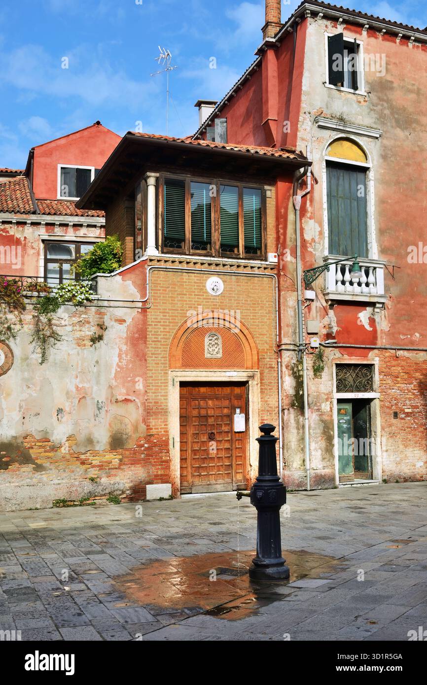 A typical little Venetian square Campiello Mosca with old plumbing ...