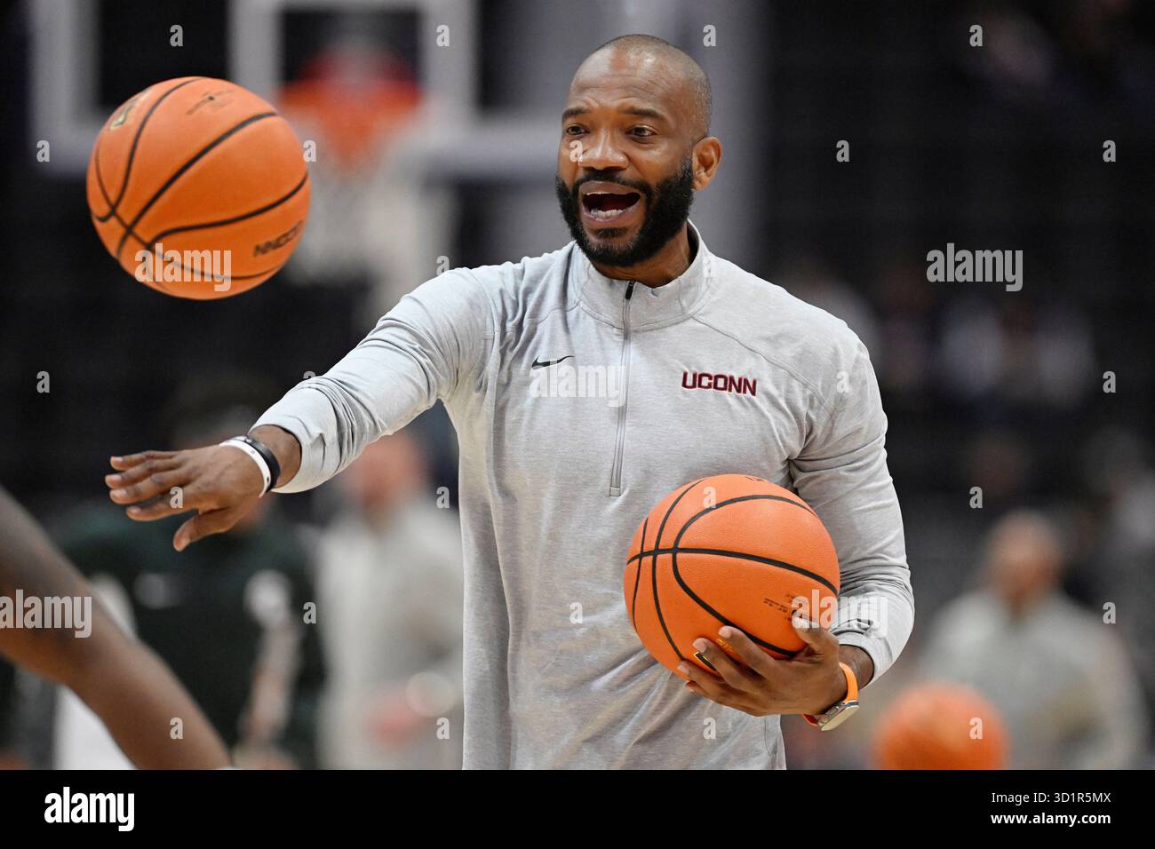 Associate head coach Kimani Young before an NCAA basketball game ...