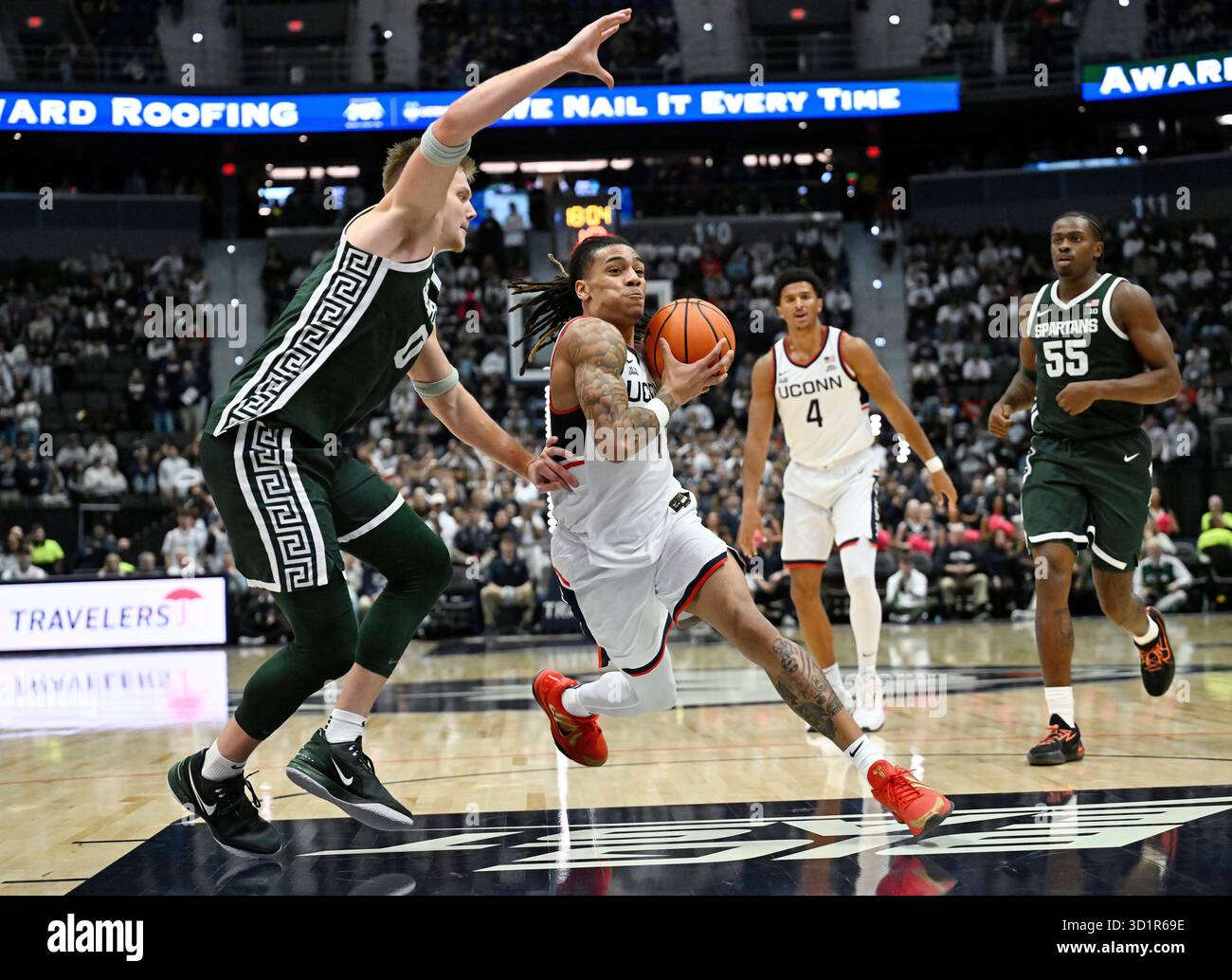 UConn guard Solo Ball (1) drives to the basket as Michigan State ...