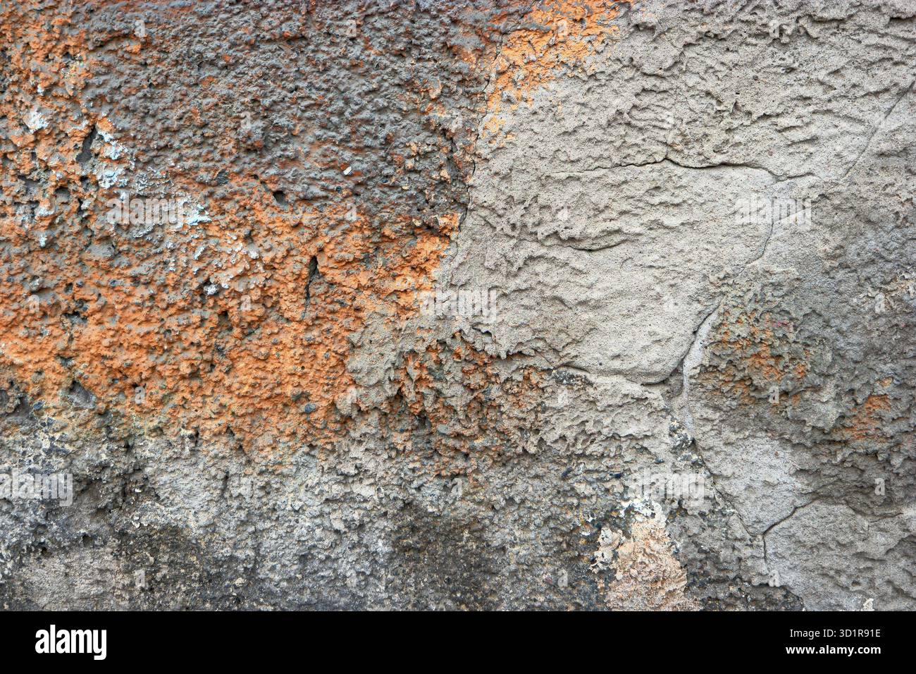 Messy cement wall texture with spot of orange paint Stock Photo - Alamy